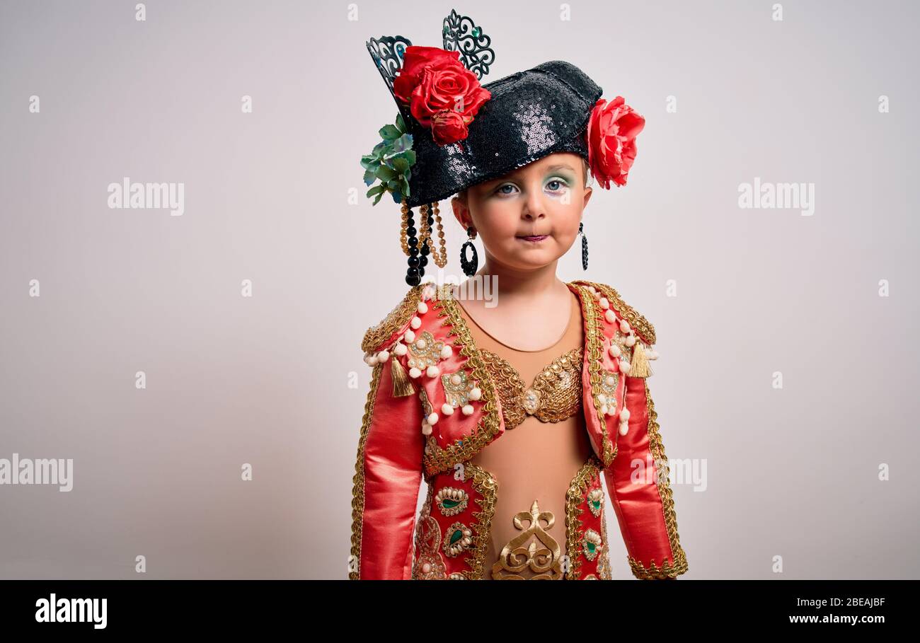 Young little caucasian kid girl wearing bullfighter traditional folkore ...