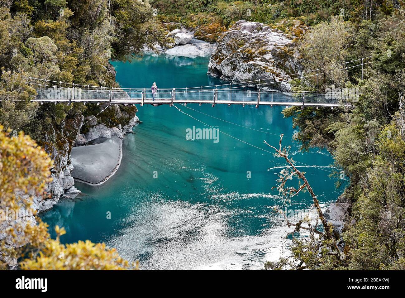 New zealand glacier water river suspension bridge hi-res stock ...