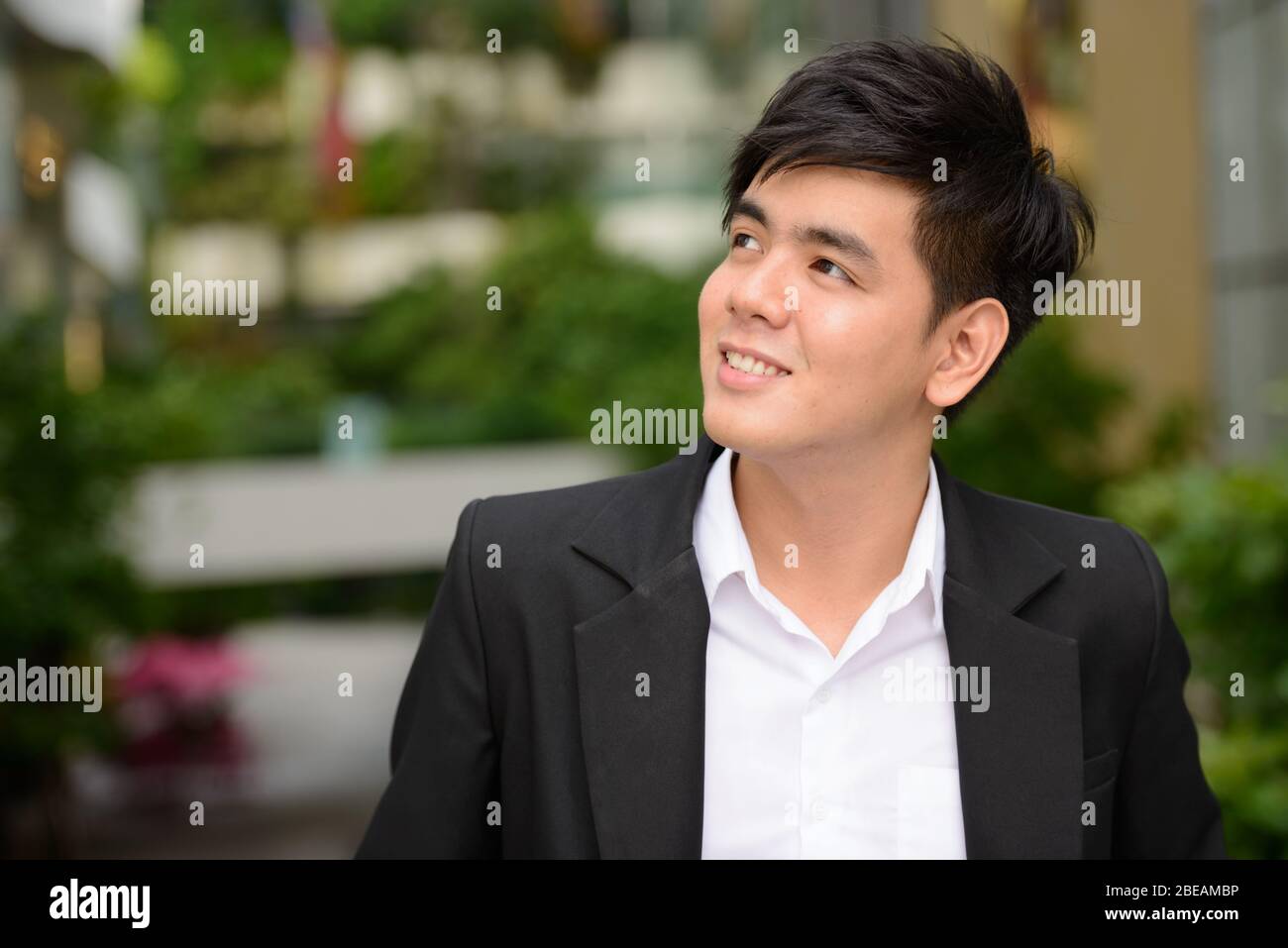 Happy young filipino businessman hi-res stock photography and images ...