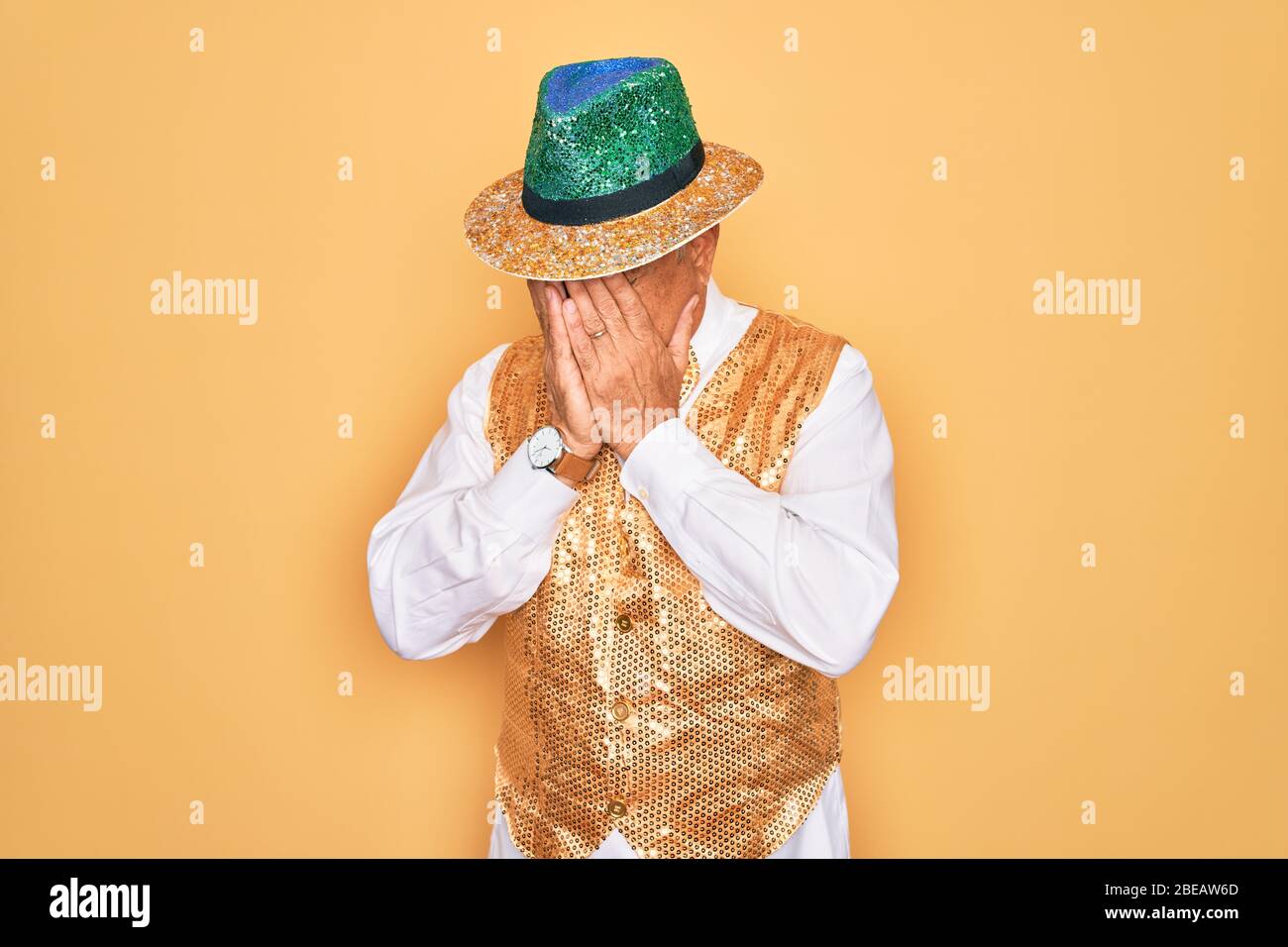 Middle age senior grey-haired man wearing Brazilian carnival custome ...