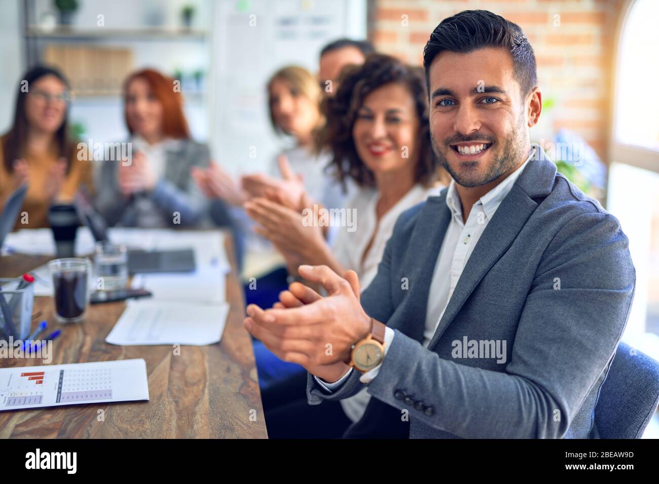 Group of business workers smiling happy and confident. Working together ...