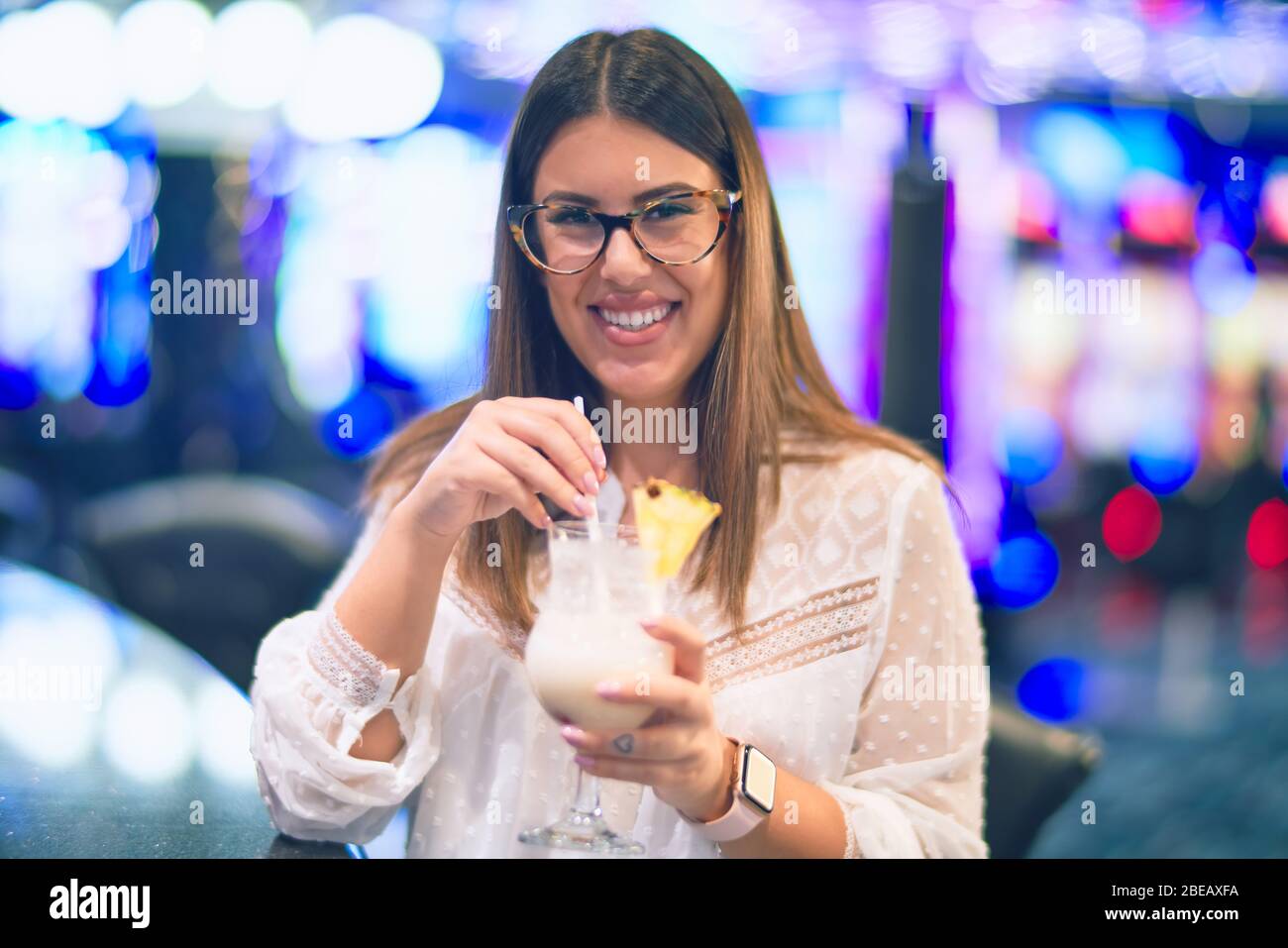 Young beautiful woman on vacation smiling happy and confident. Standing ...