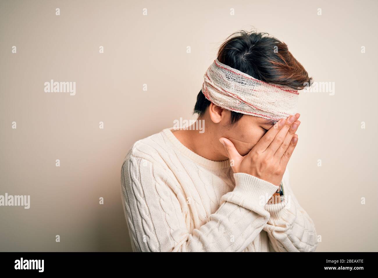 Young handsome chinese man injured for accident wearing bandage and ...