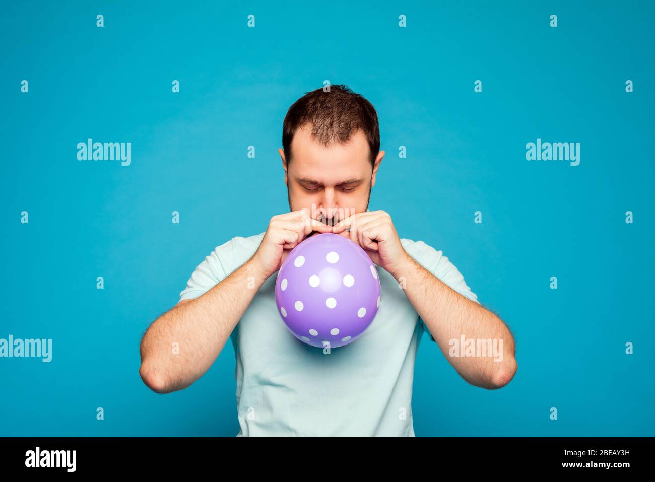 Girl inflate balloon hi-res stock photography and images - Alamy