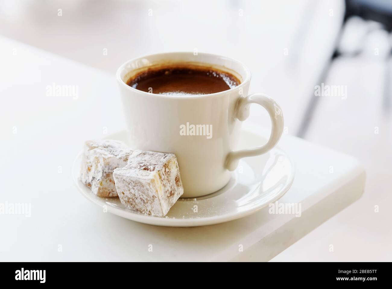 Cup of Greek - Turkish coffee isolated on white background with sweety ...