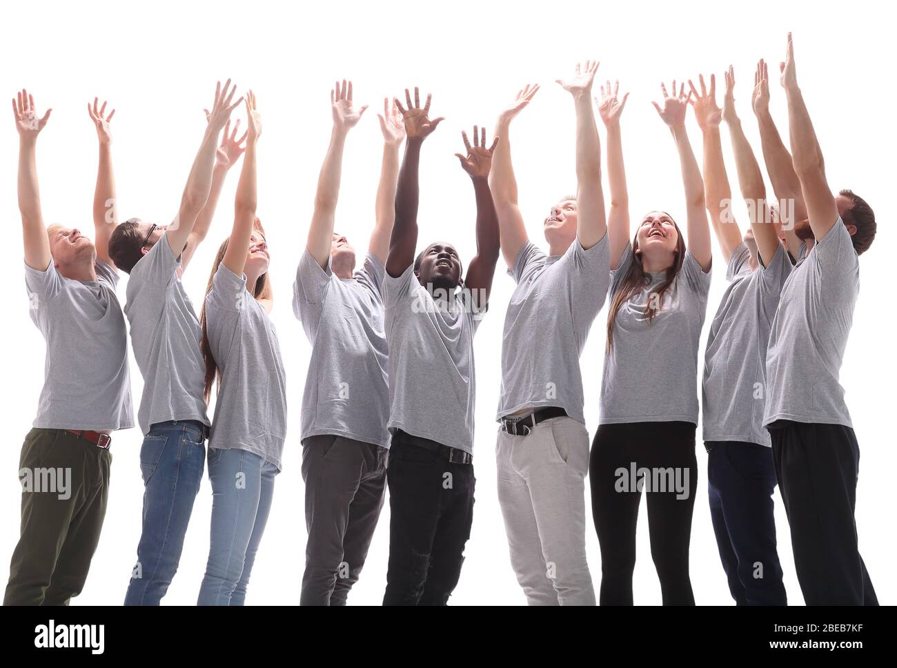 happy young people stretching their hands up Stock Photo - Alamy