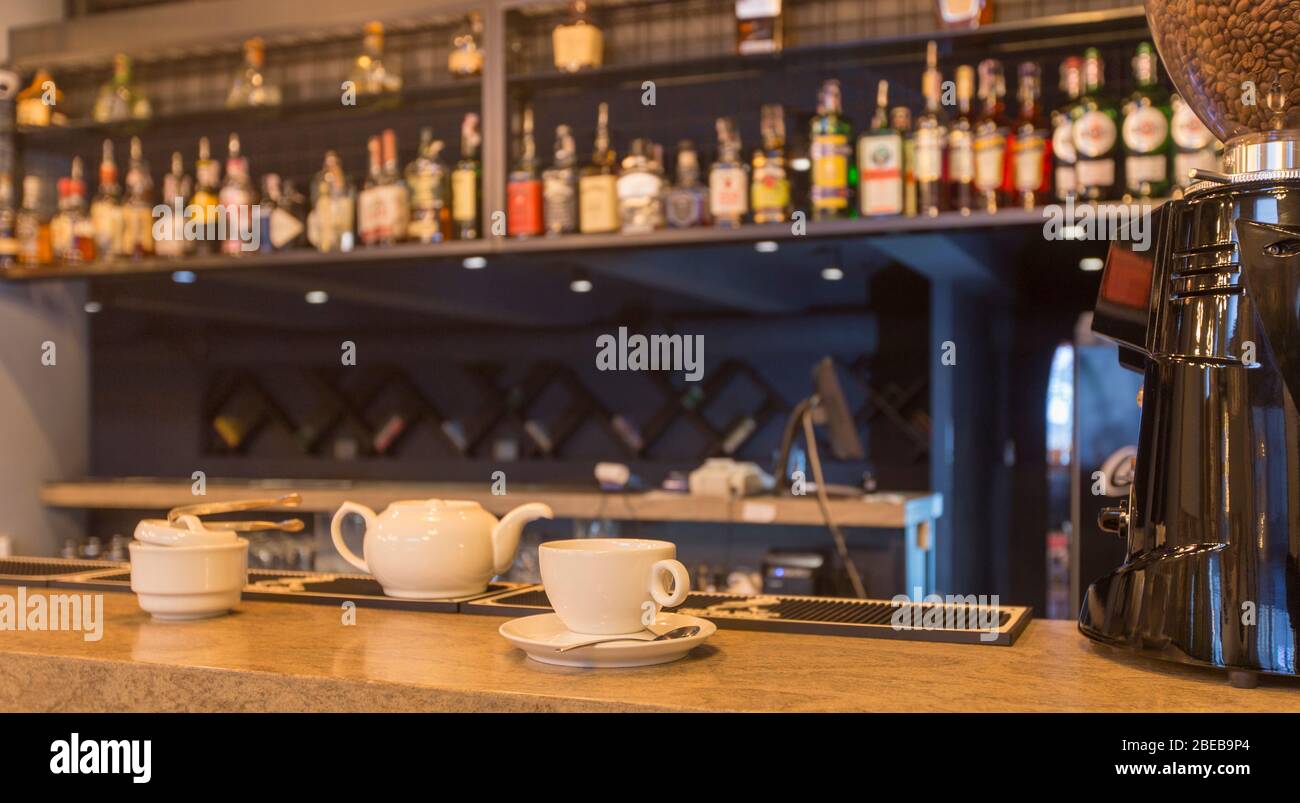 Stylish restaurant in a loft style, bar with tea set Stock Photo - Alamy
