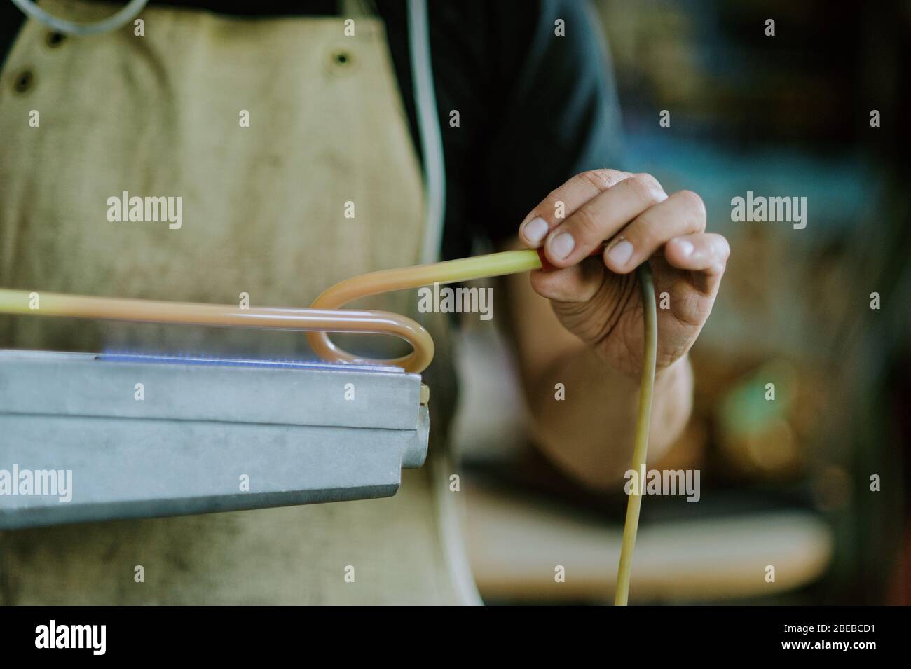 Glass-blowing workshop. Burner. Production of neon tubes. gas-burner ...