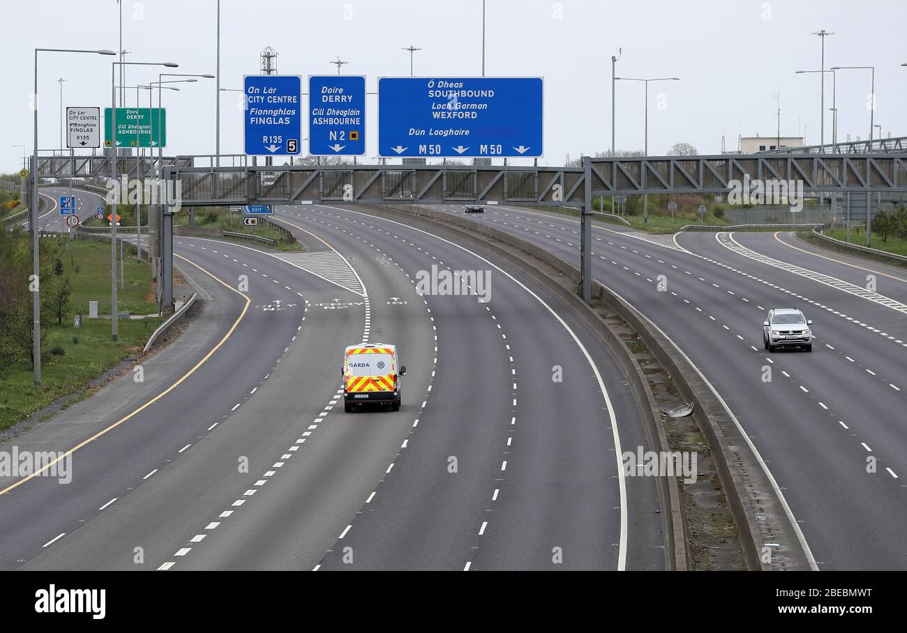 A Garda vehicle on an almost deserted section of the M50 motorway in ...
