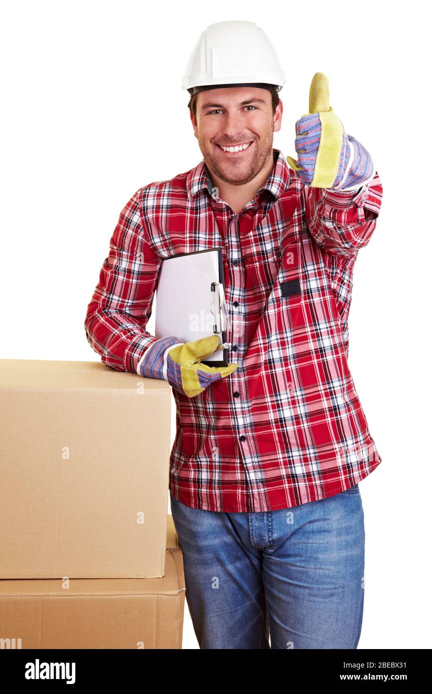 Warehouse worker with lots of boxes holds thumbs up Stock Photo - Alamy