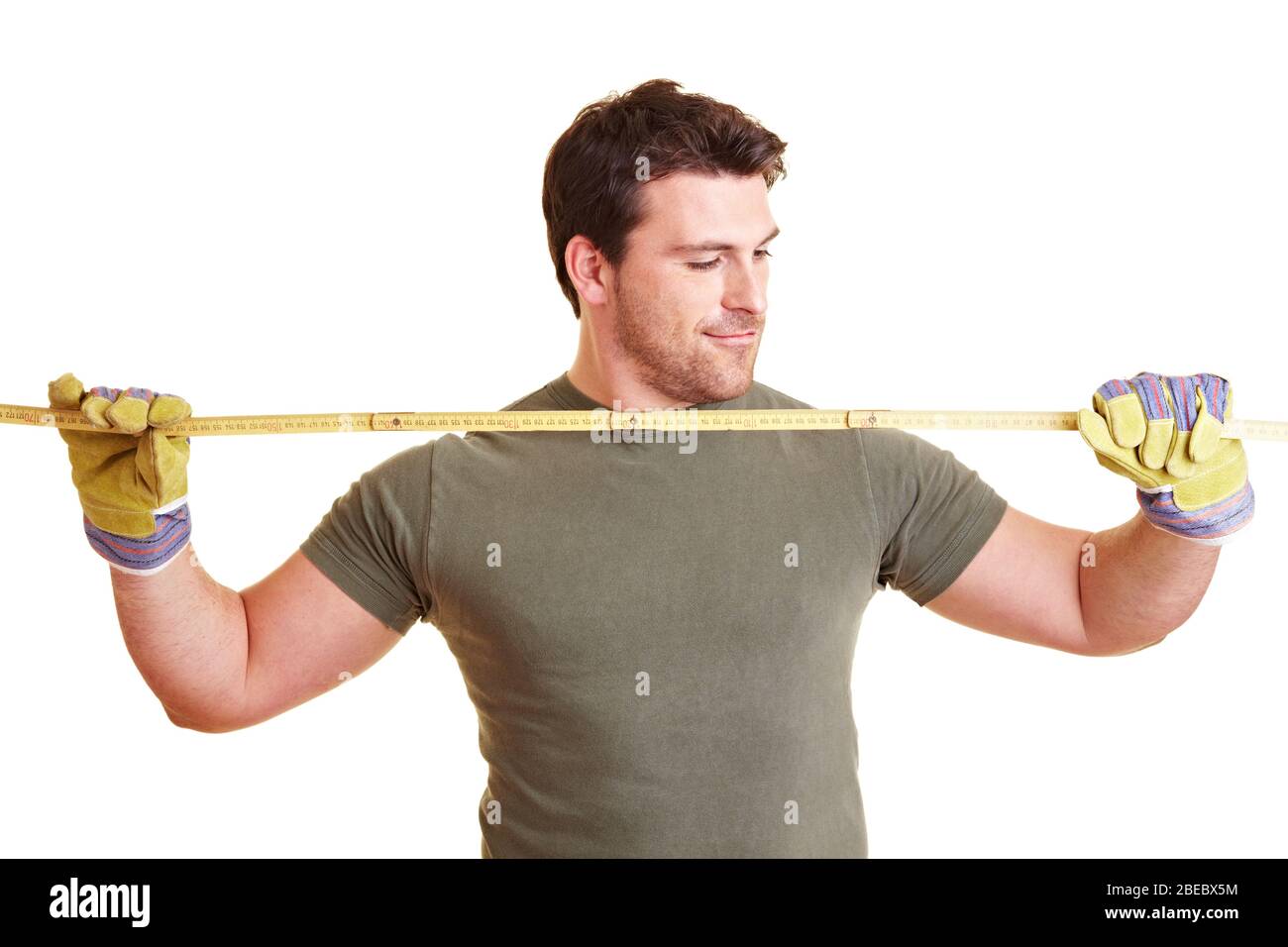 Artisan uses a long ruler Stock Photo - Alamy