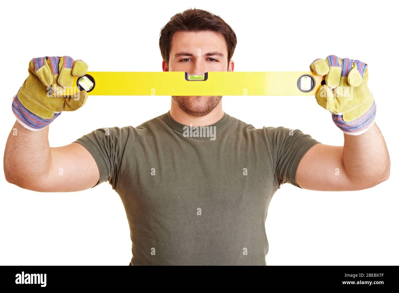 Artisan uses a spirit level for horizontal alignment Stock Photo - Alamy