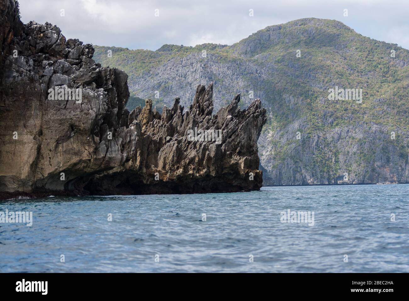 Transparent turquoise water limestone razor rocks near Coron island ...