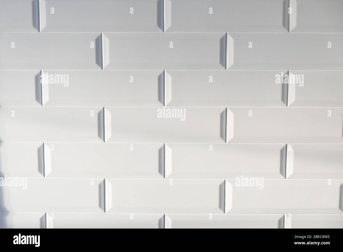 White tile background. Tiles in the kitchen Stock Photo - Alamy