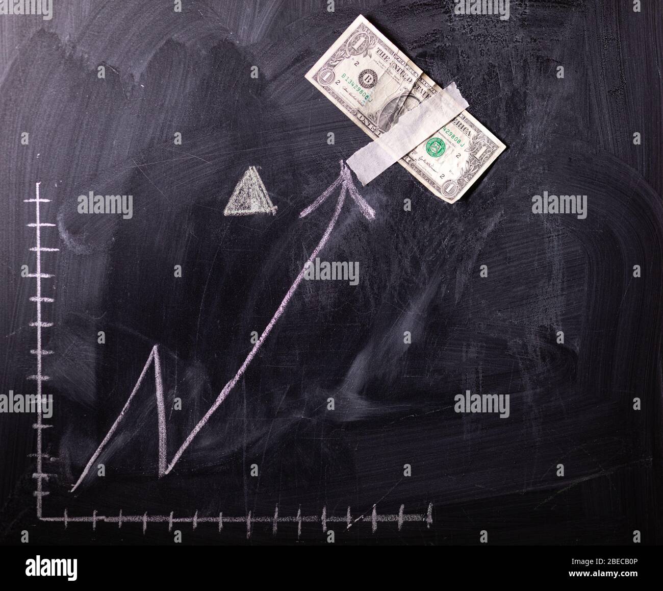 Dollar growth chart drawn on chalkboard. Investment concepts and ...