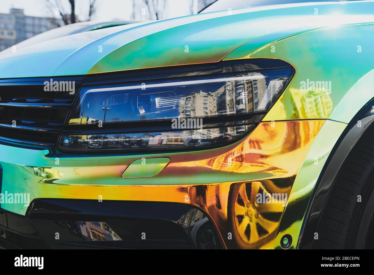 Chameleon holographic colour car. Front view closeup. Modern LED ...