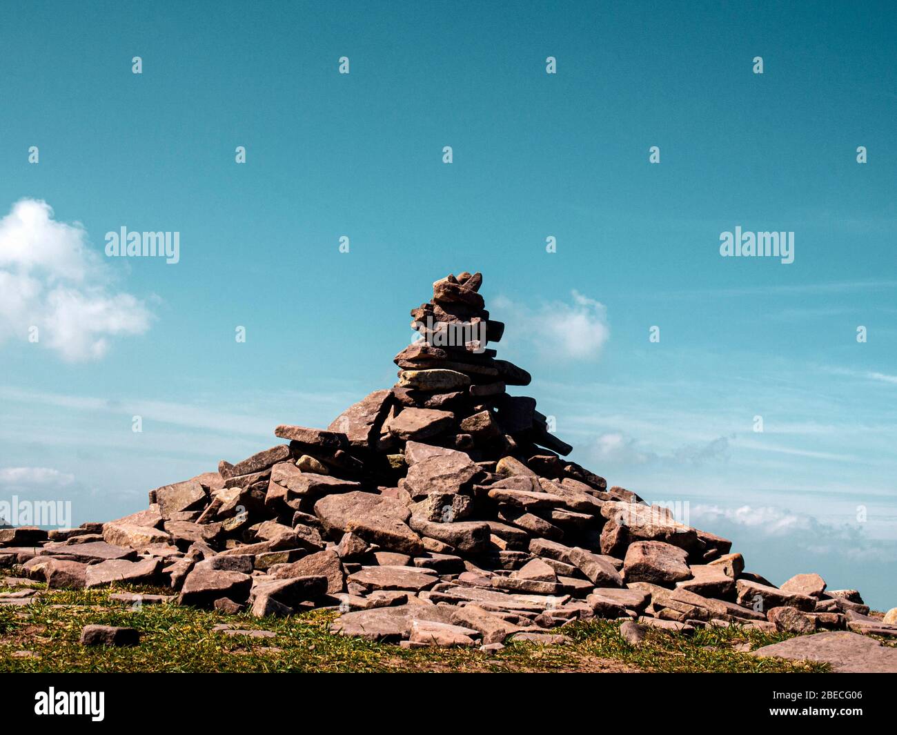 Group of stones gathered to make shape of a mountain on a mountain ...