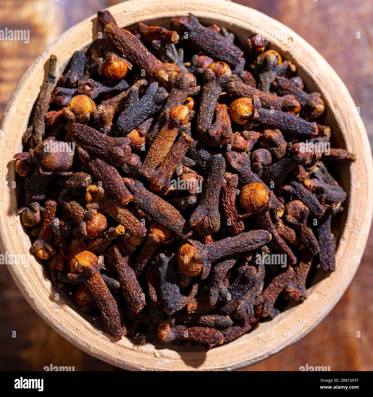 Indian spices collection, dried aromatic cloves flower buds and another ...