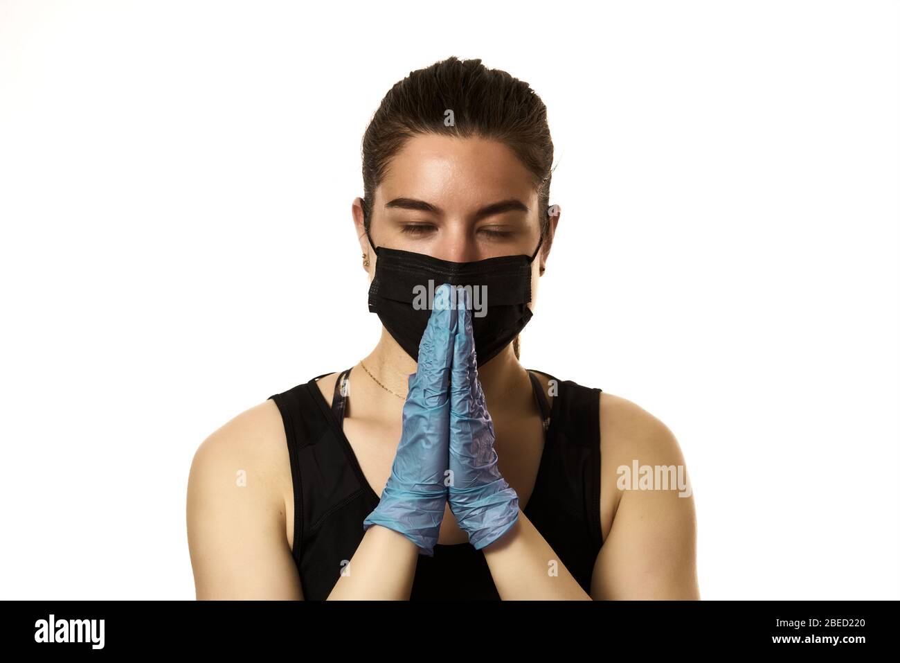 Image of young Caucasian woman dresses facial medical mask, disposable ...