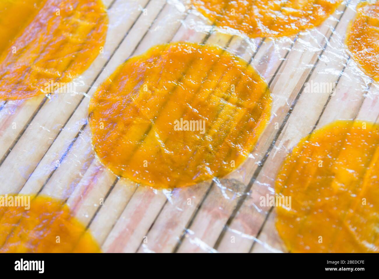 Solar-dried mango sheet Stock Photo - Alamy
