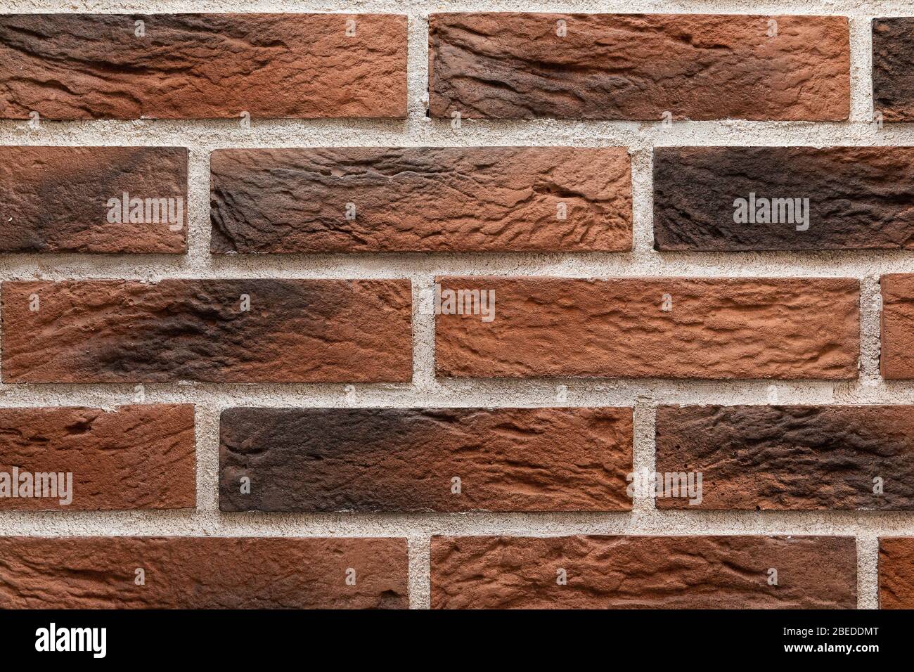Modern brown brick wall texture background Stock Photo - Alamy