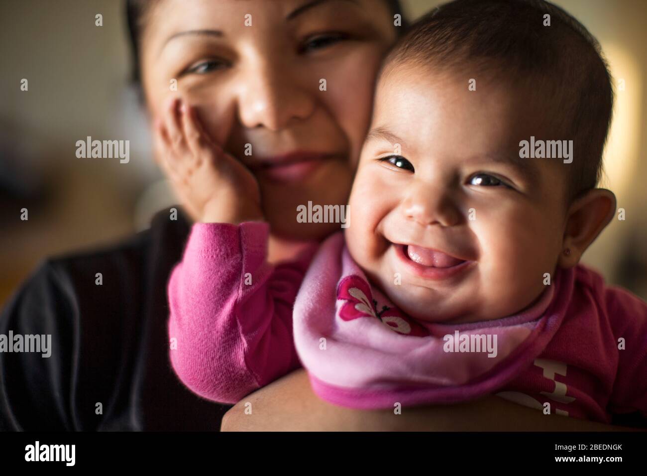 Child being held hi-res stock photography and images - Alamy