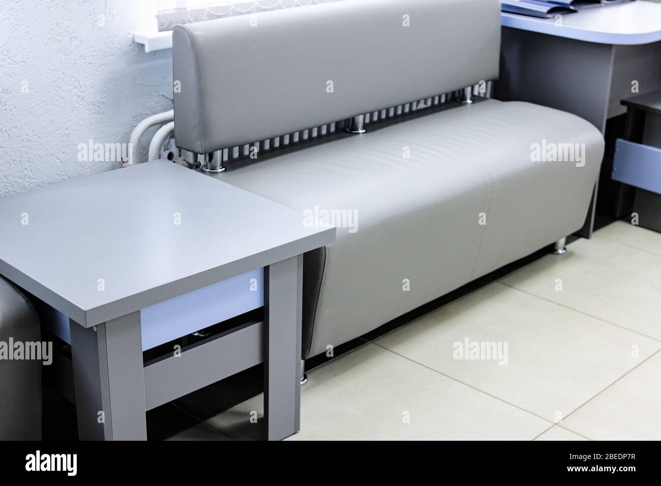 Sofas and tables in the waiting room Stock Photo - Alamy