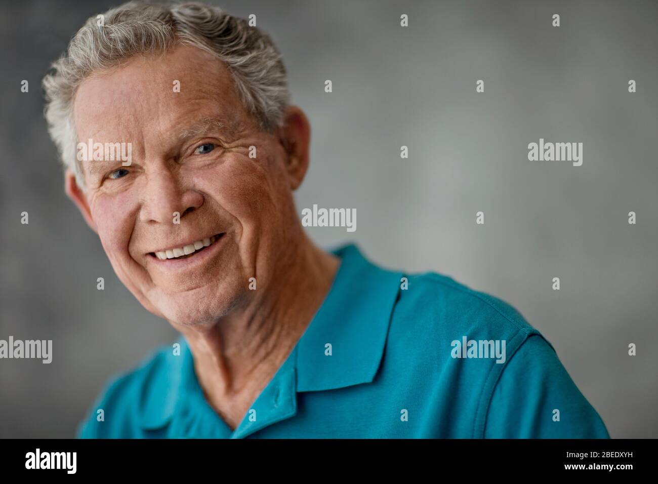 Portrait of a smiling senior man Stock Photo - Alamy