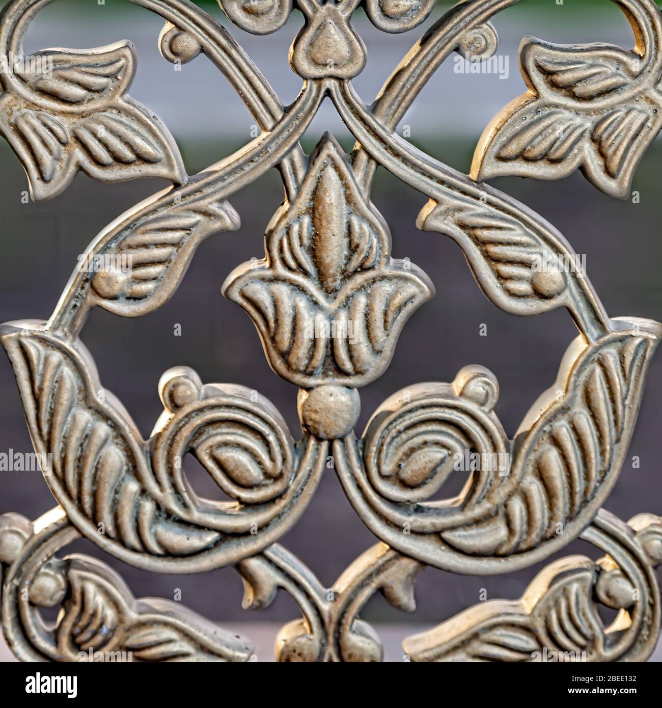 Forged black metal elements of fence close-up. Wrought iron decoration ...