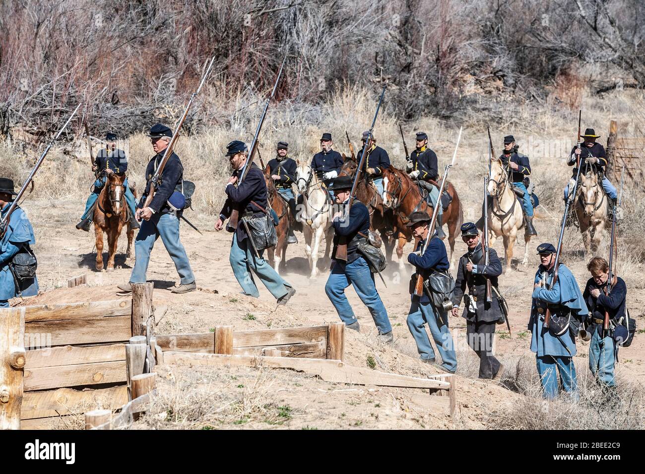 Union Army soldiers and cavalry on the march, Civil War reenactment ...