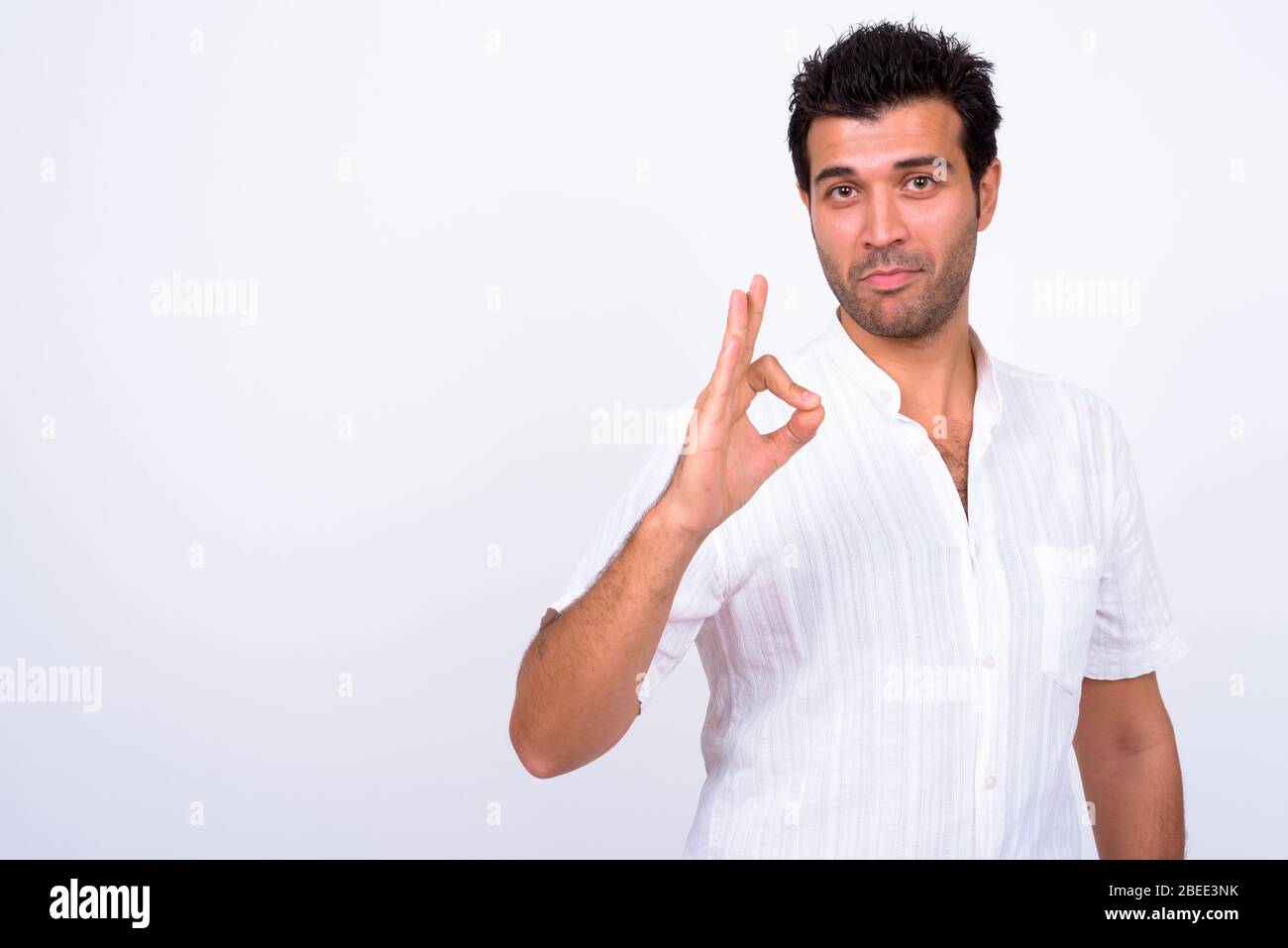 Portrait of handsome Turkish man with ok sign Stock Photo - Alamy