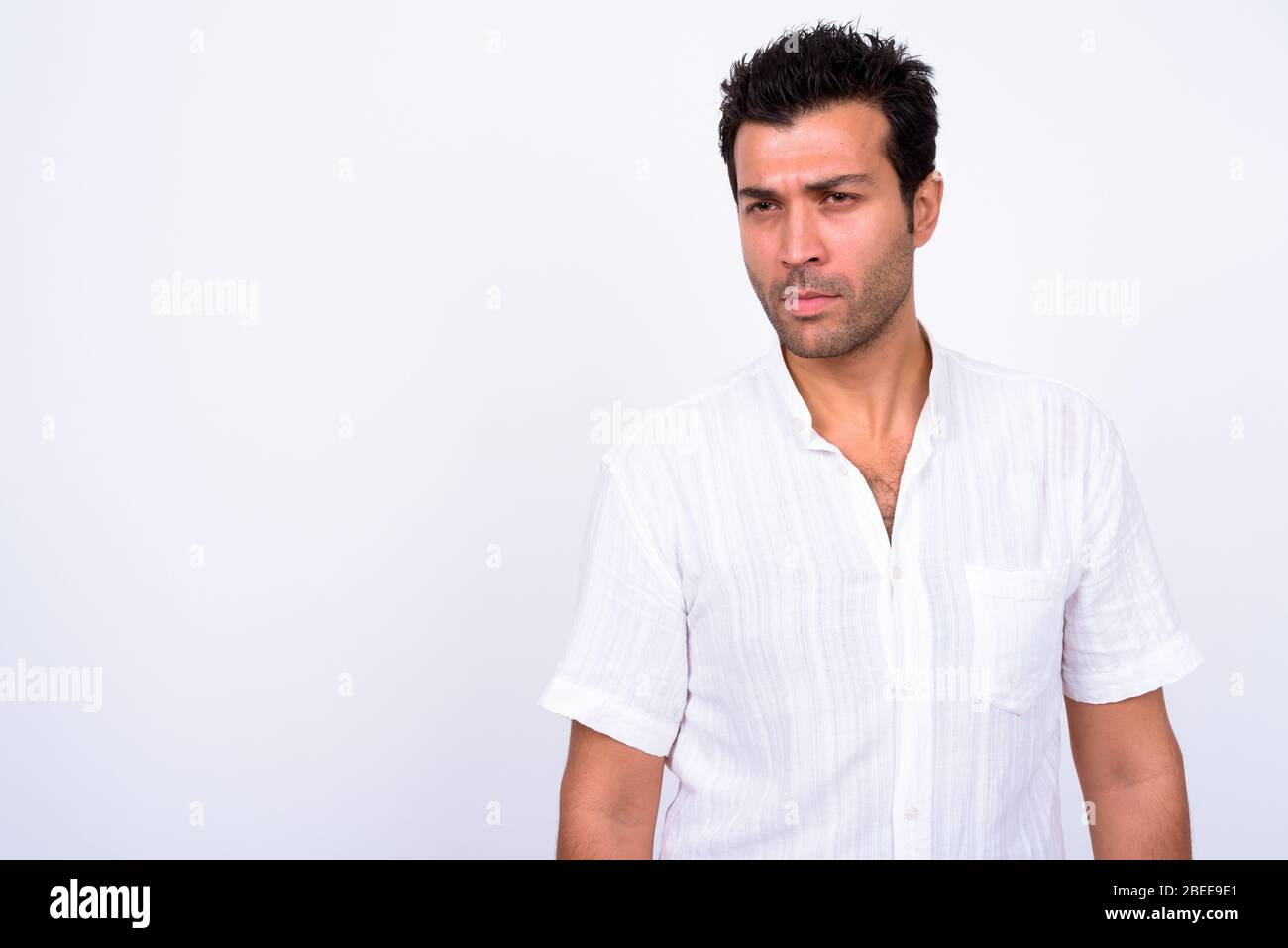 Portrait of stressed Turkish man looking away Stock Photo - Alamy