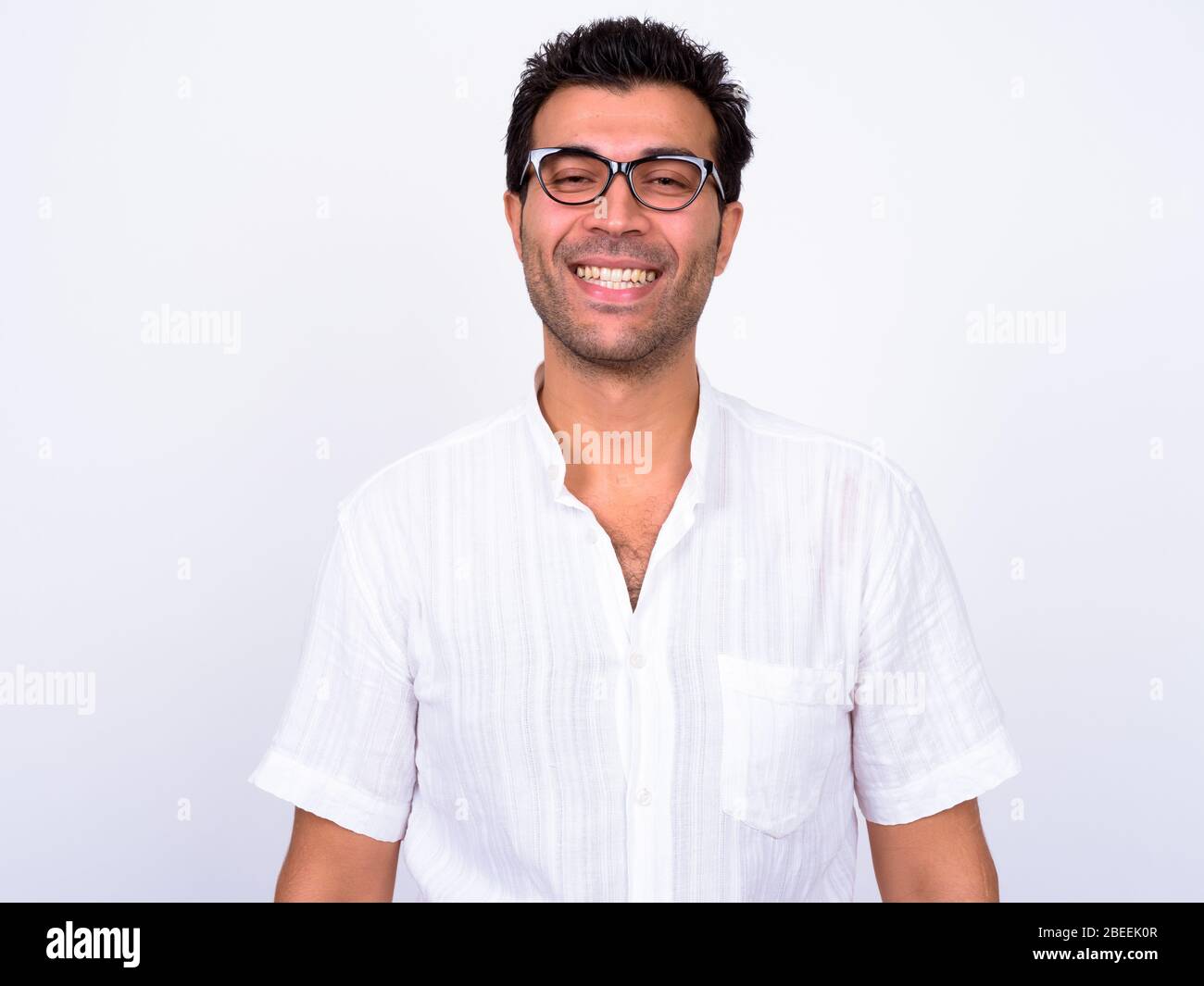 Portrait of happy handsome Turkish man with eyeglasses smiling Stock ...