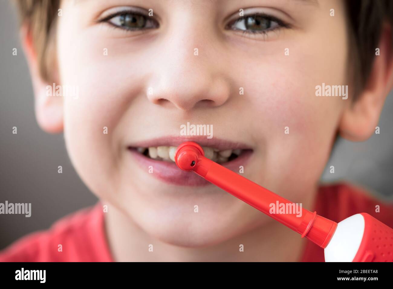Teen boy brushing teeth hi-res stock photography and images - Alamy