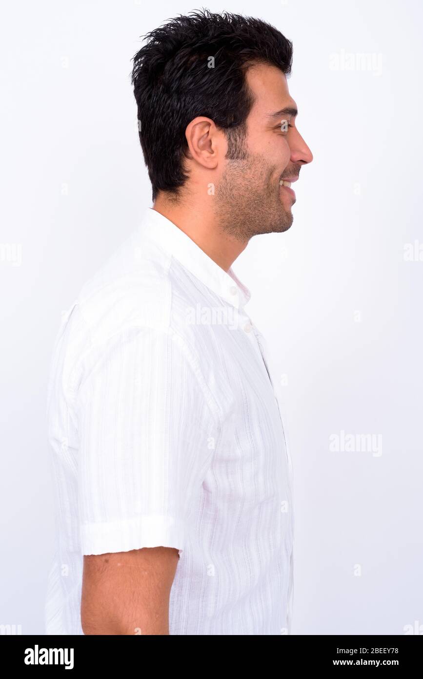 Profile view of happy handsome Turkish man smiling Stock Photo - Alamy