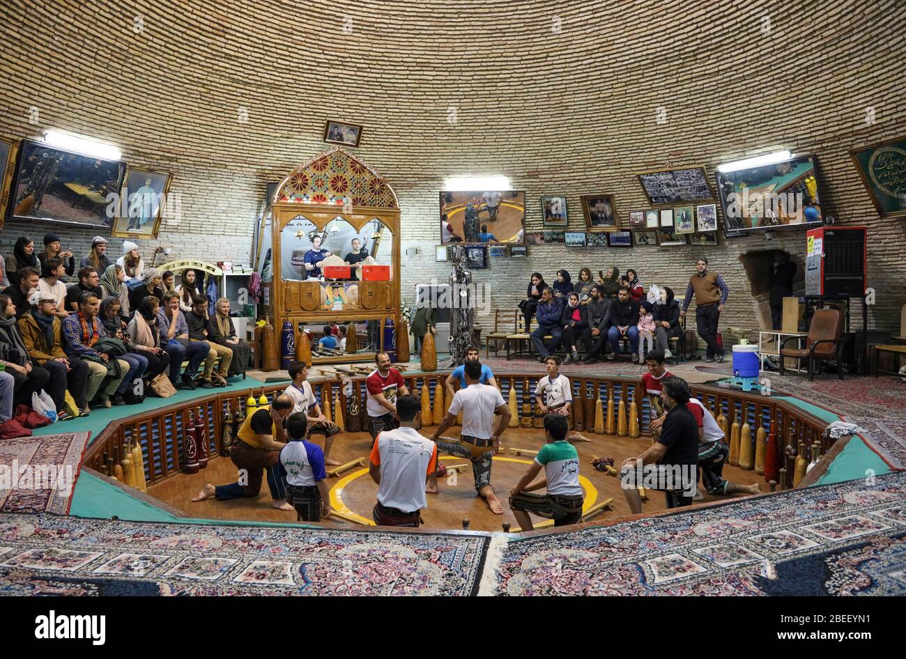 People are watching the traditional Pahlevani and Zourkhaneh (Zurkhaneh ...