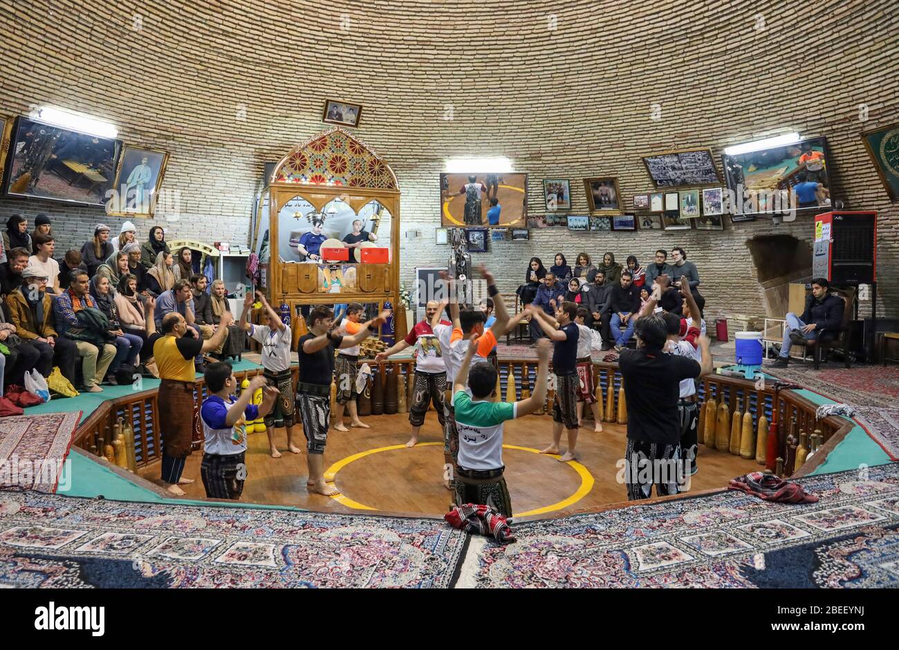 People are watching the traditional Pahlevani and Zourkhaneh (Zurkhaneh ...