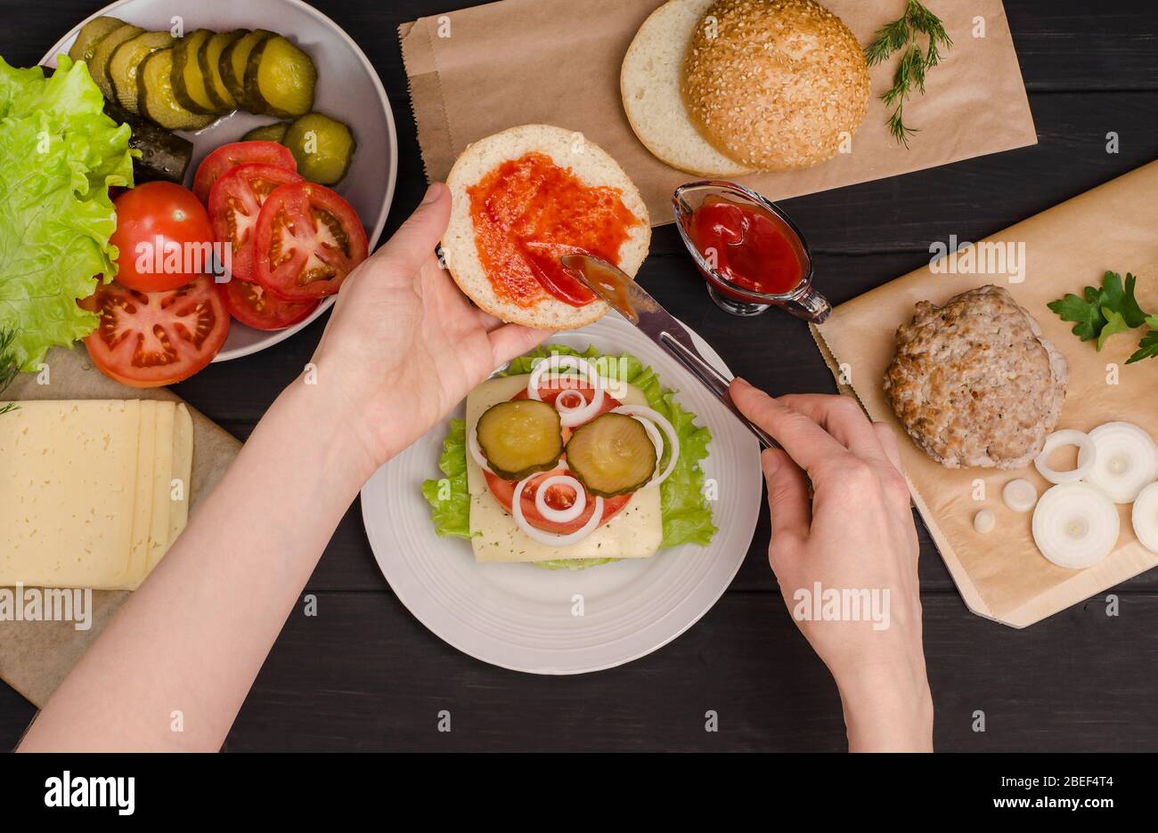Cooking a homemade hamburger step by step. Step 9. Spread the top of ...