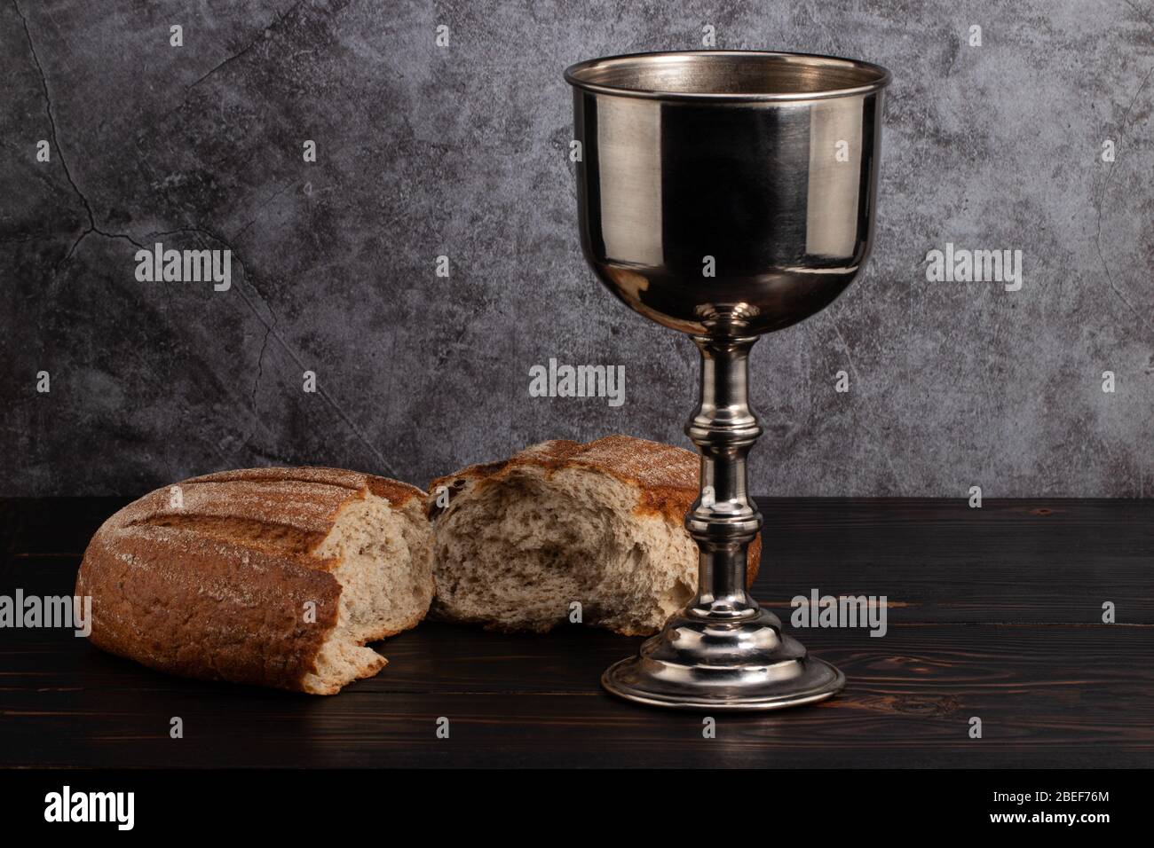 holy communion chalice with wine and bread Stock Photo - Alamy