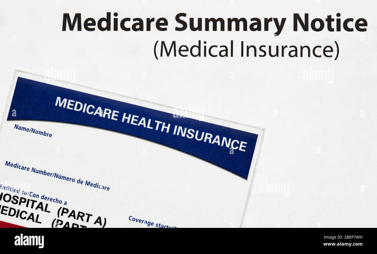 Medicare health insurance card with Summary Notice isolated on white ...