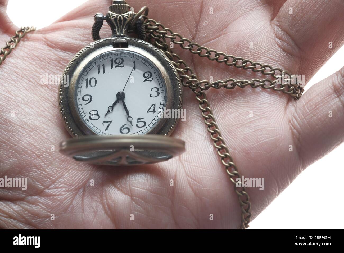 Clock on hand hi-res stock photography and images - Alamy