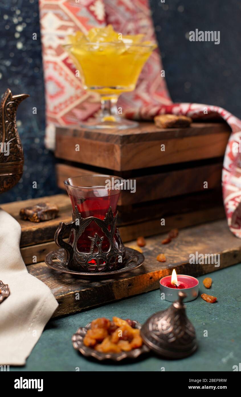 tasty tea and snack with wooden background Stock Photo - Alamy