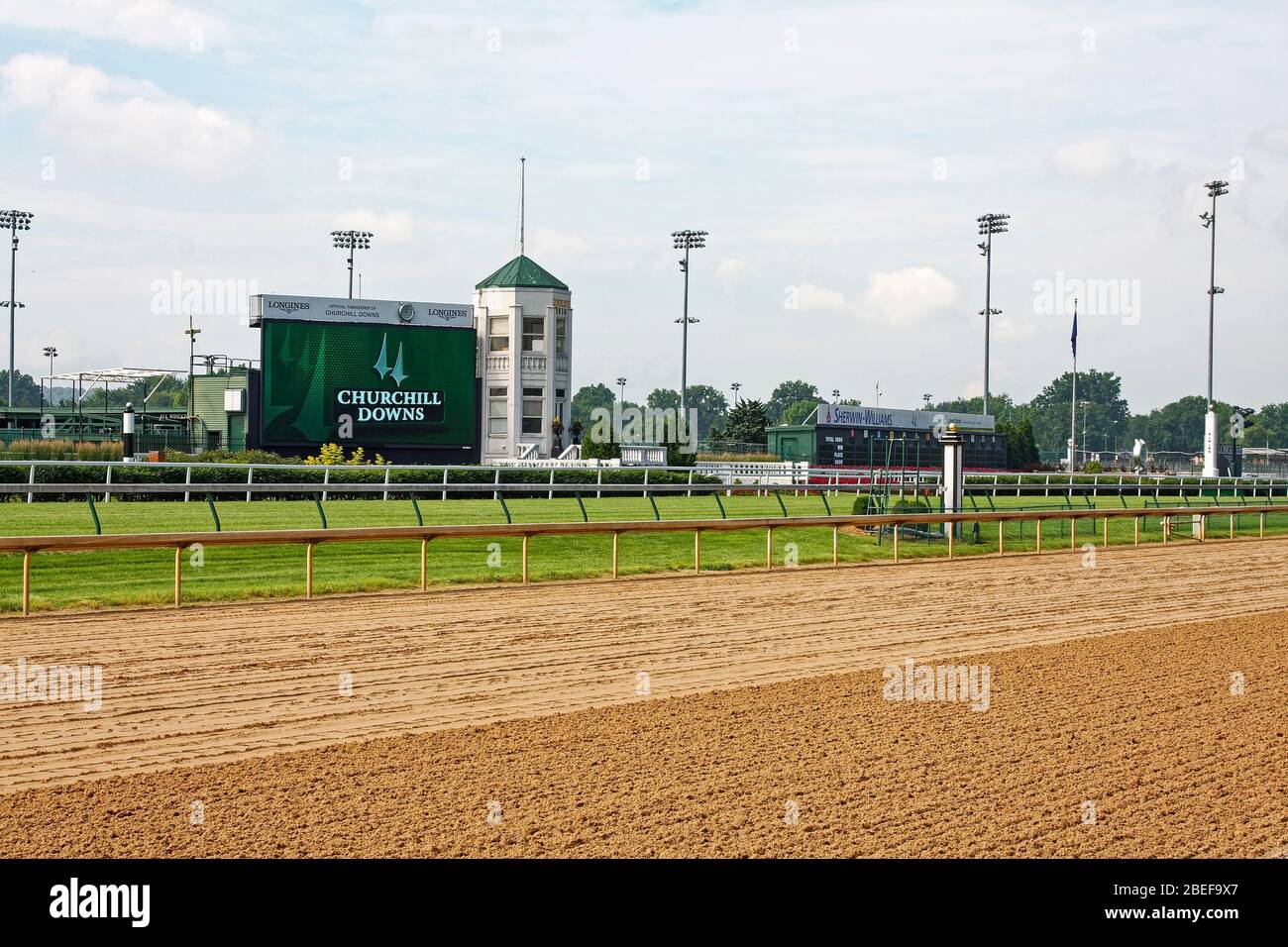 Churchill Downs Racetrack; dirt track, turf track, railings, signs ...