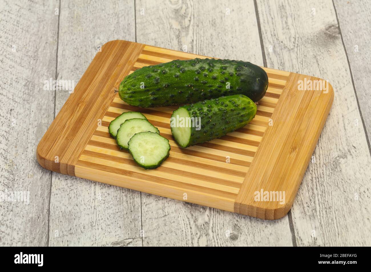 Ripe fresh green two cucumbers ready for vegan Stock Photo - Alamy