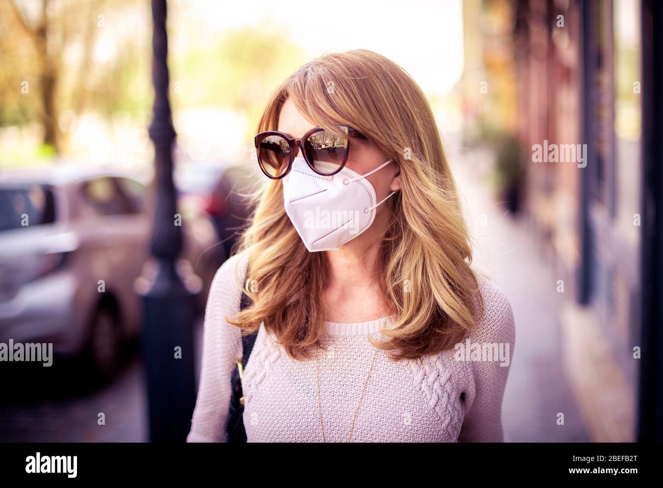 Avoid touching her face hi-res stock photography and images - Alamy