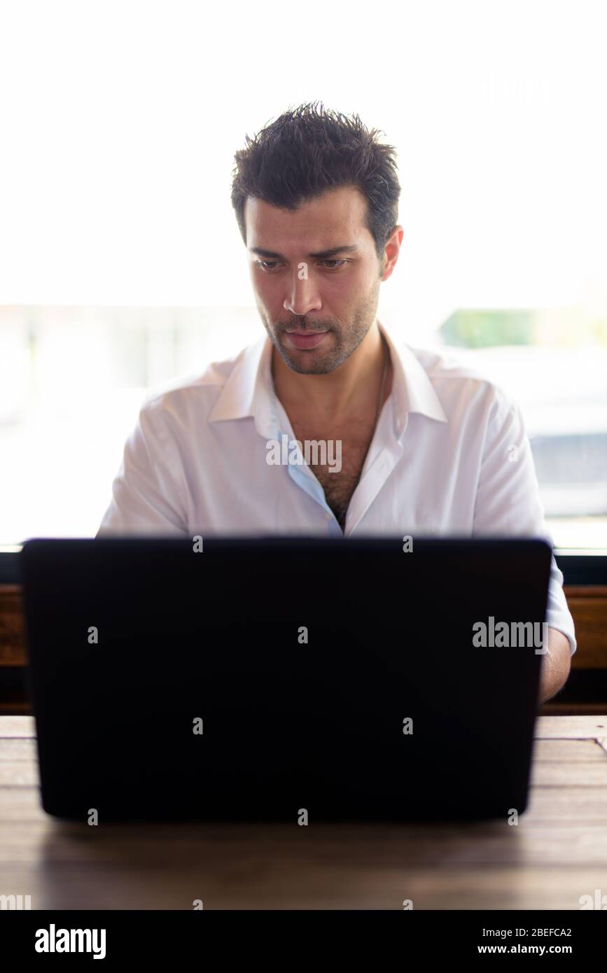 Portrait of handsome Turkish man relaxing at the coffee shop Stock ...