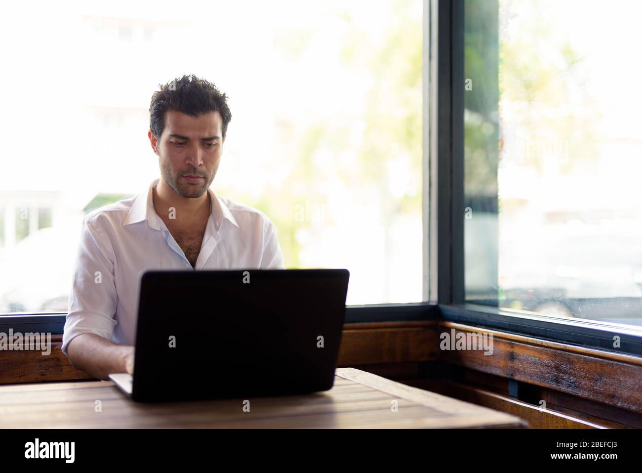 Portrait of handsome Turkish man relaxing at the coffee shop Stock ...