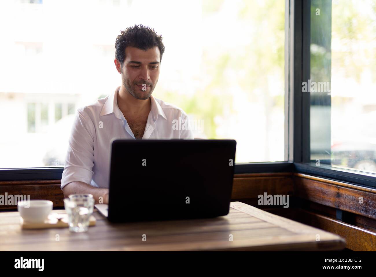 Portrait of handsome Turkish man relaxing at the coffee shop Stock ...