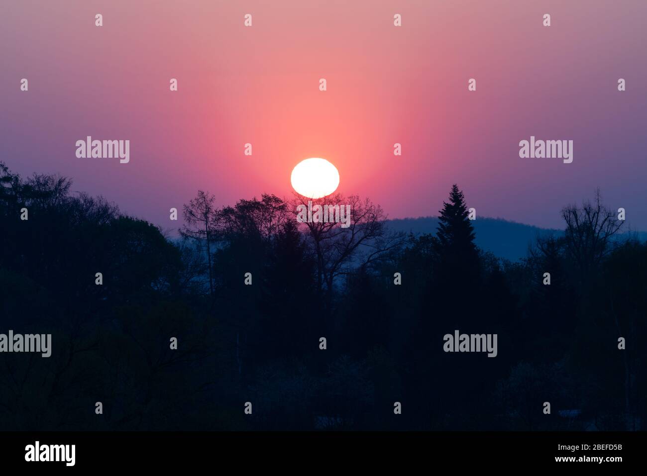 Sun during sunrise against the background of an orange sunset sky Stock ...