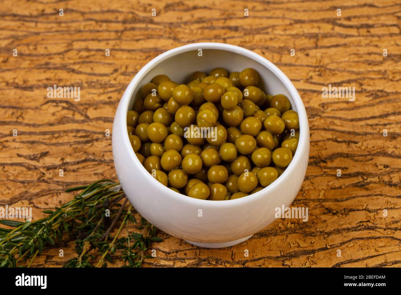 Marinated Pickled green peas in the bowl Stock Photo - Alamy